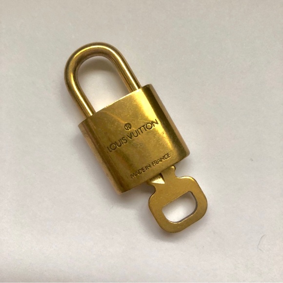 Louis Vuitton | Jewelry | Lv Lock And Key 36 | Poshmark
